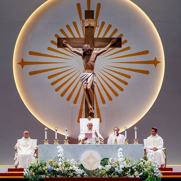 Love is what builds and endures, pope says in Singapore